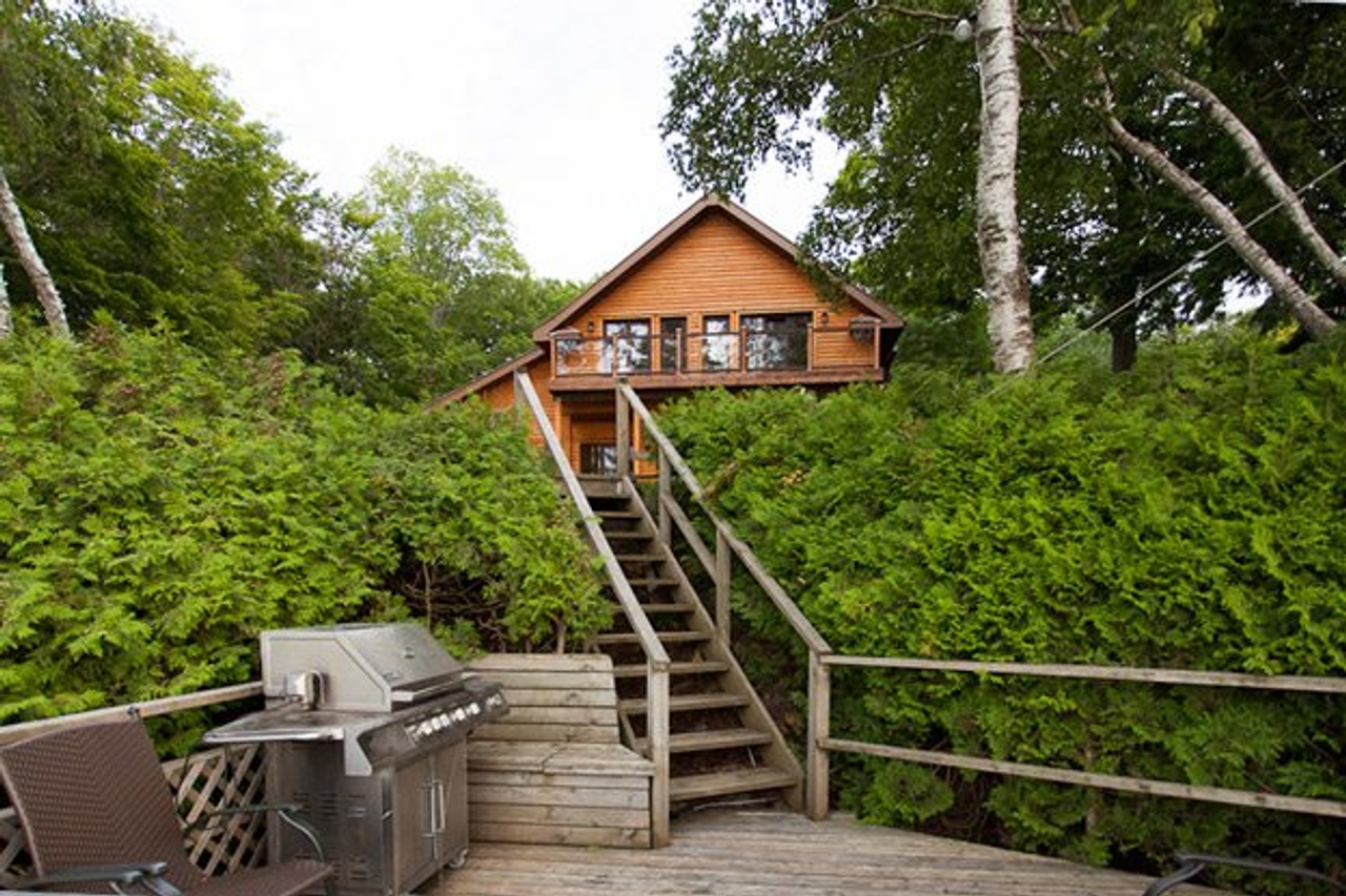 Cottage of the Week: $2 million for a log cabin with a sunset view of ...