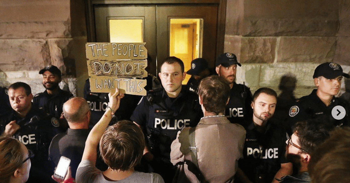 Some photos of the protest outside Doug Ford's all-night meeting to cut ...