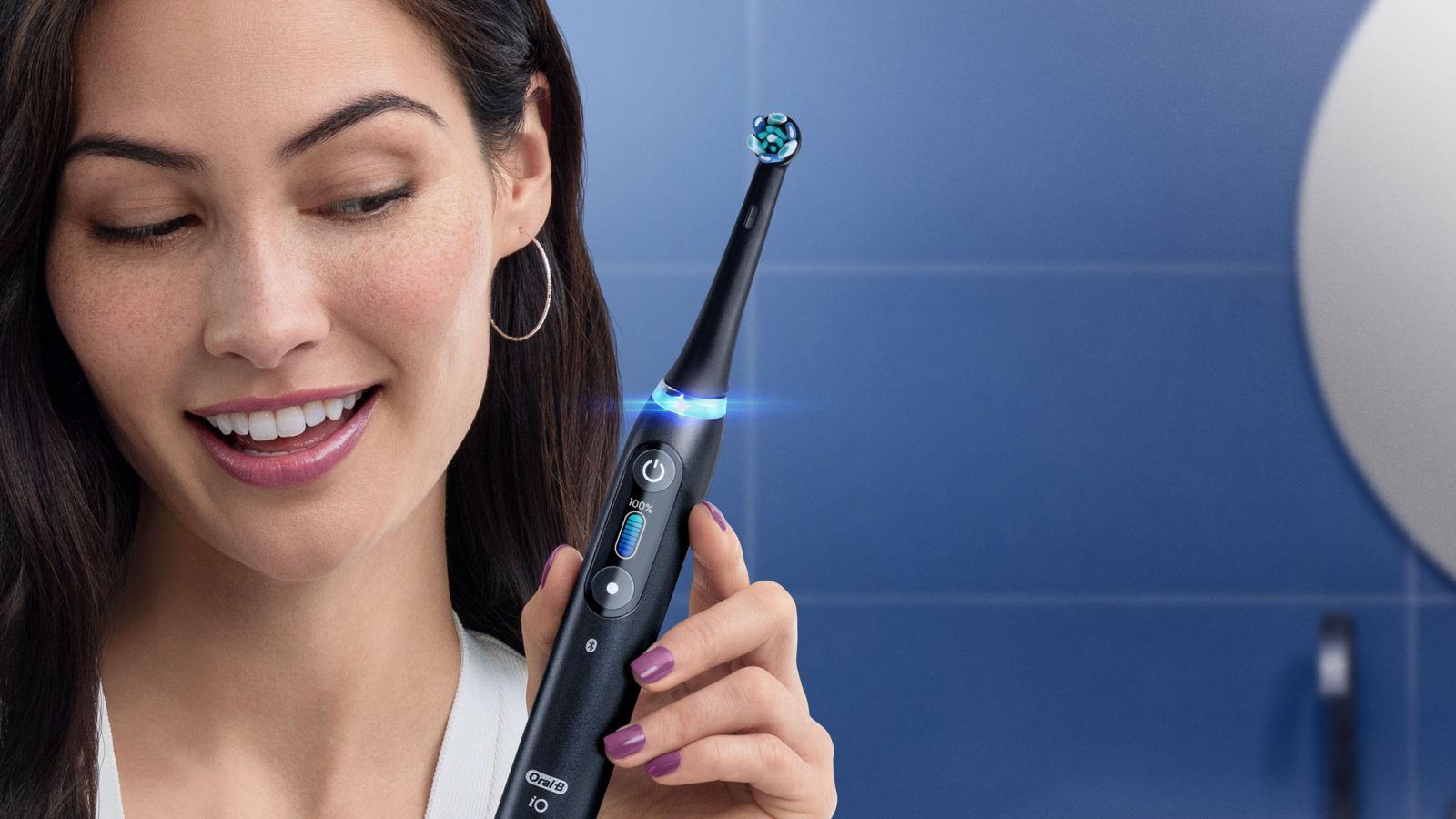 using electric toothbrush on face