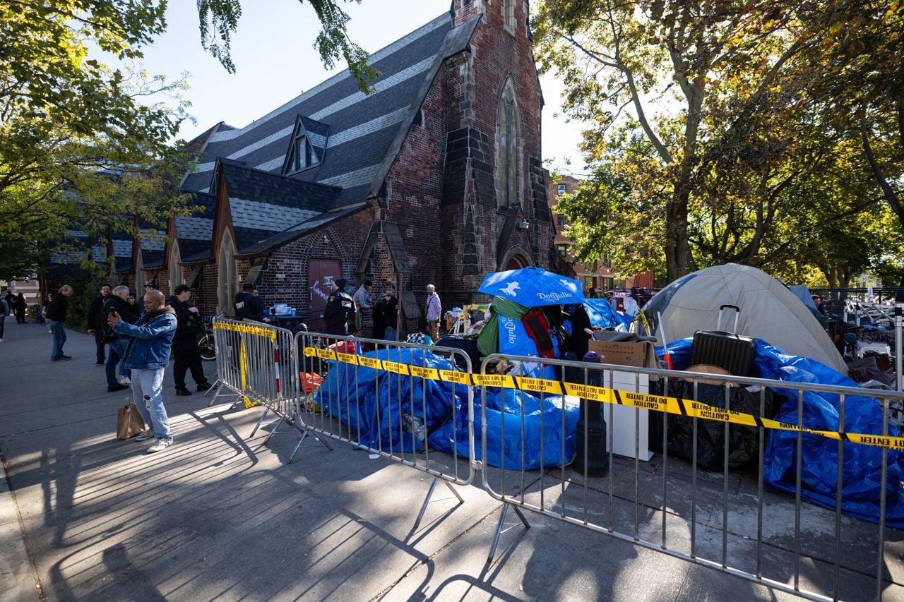 A churchyard homeless encampment was cleared less than 24 hours after a ...